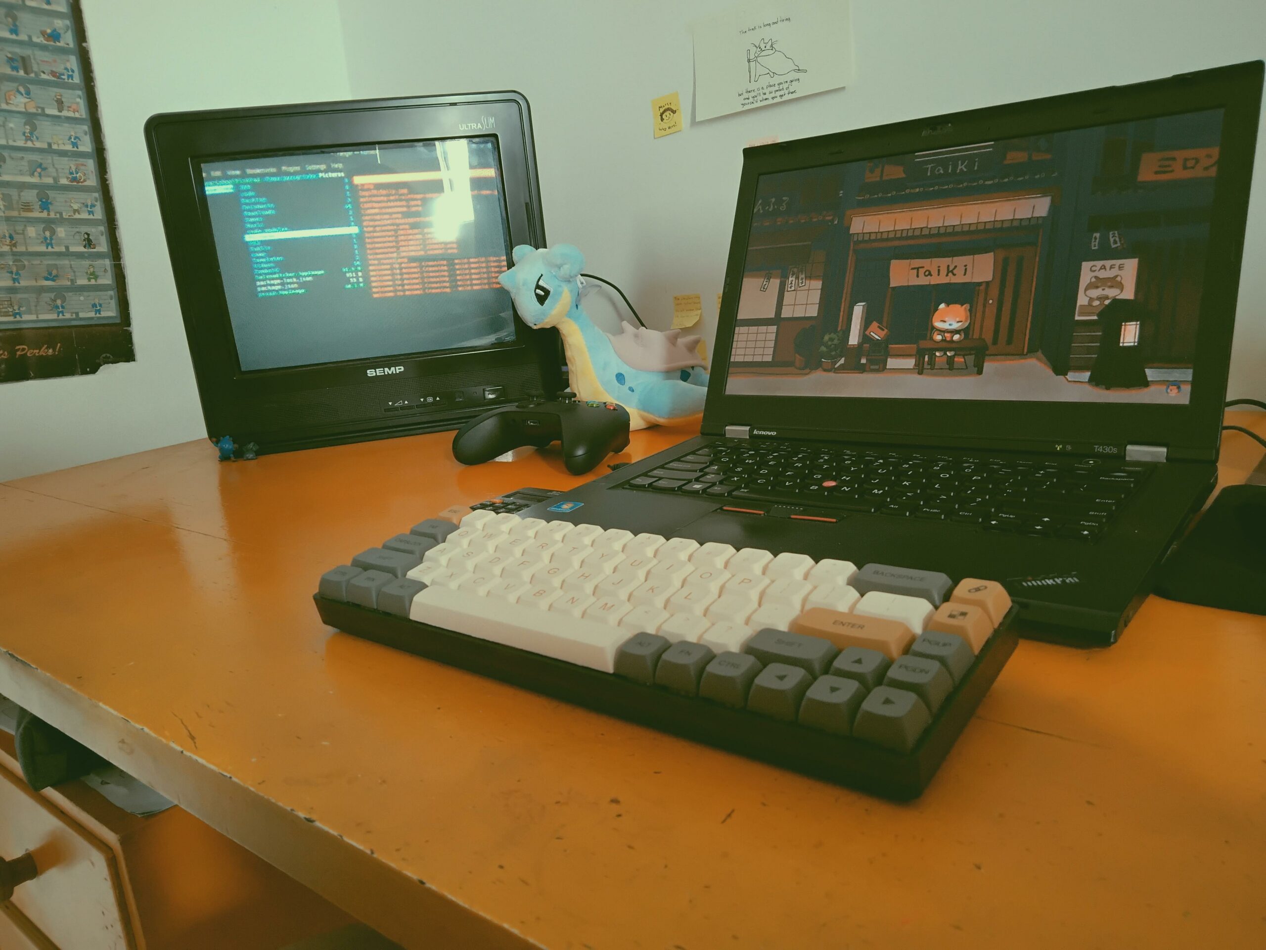 my setup: a secondhand thinkpad and a repurposed $5 CRT TV as an extra ...