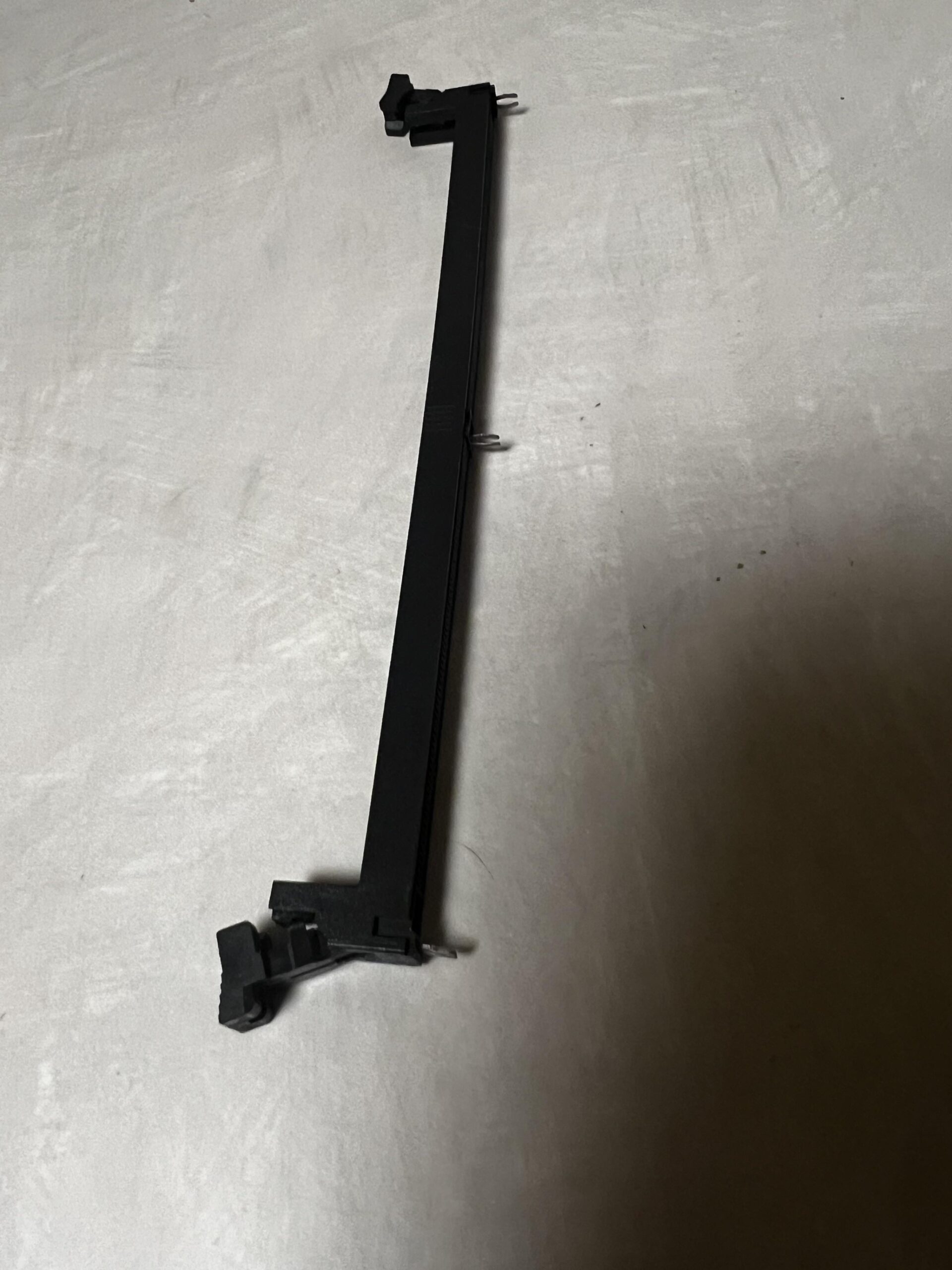 Was taking RAM stick out and whole dock for stick of RAM came with it ...